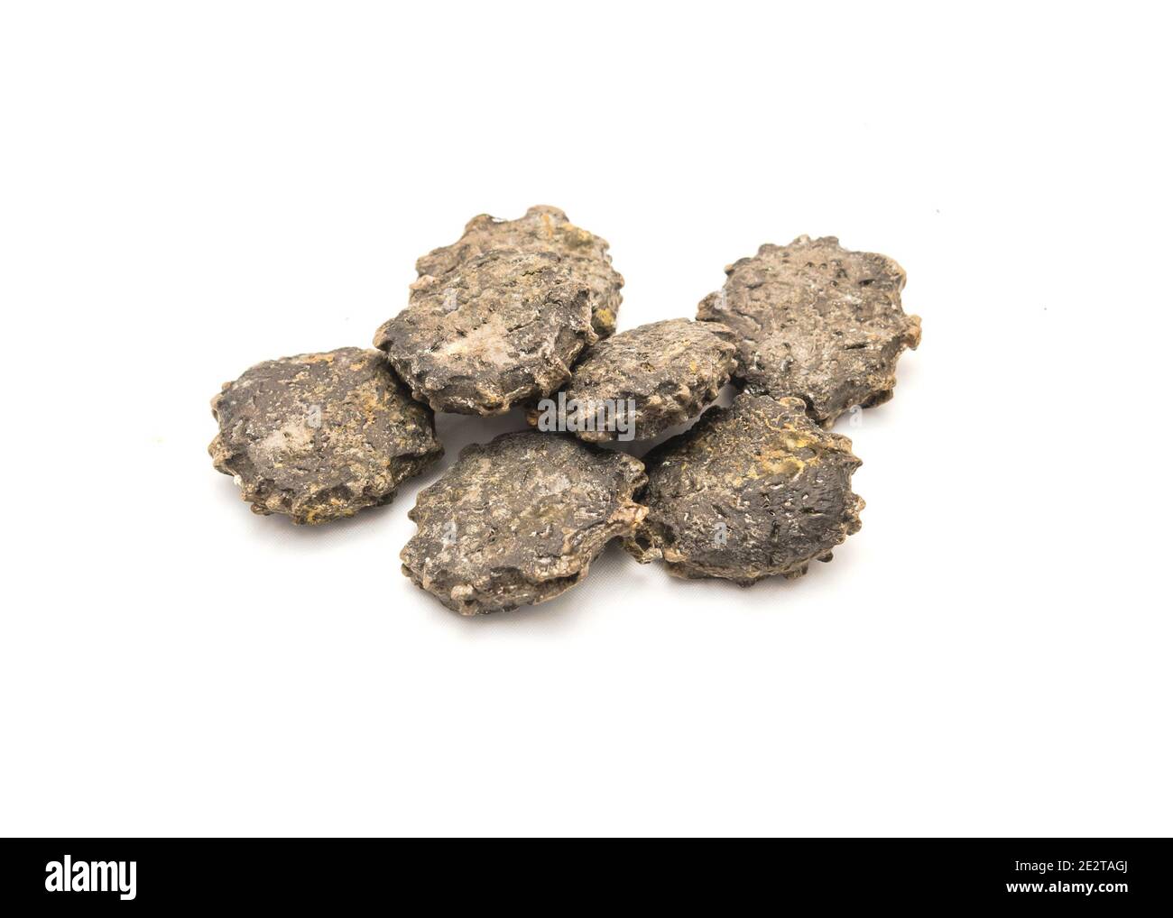 Group of gac seeds or momordica cochinchinensis isolated on white ...