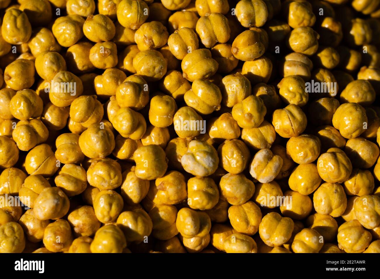 Roasted gram chana or chickpea nut. Bright sunlight gives sharp shadows ...