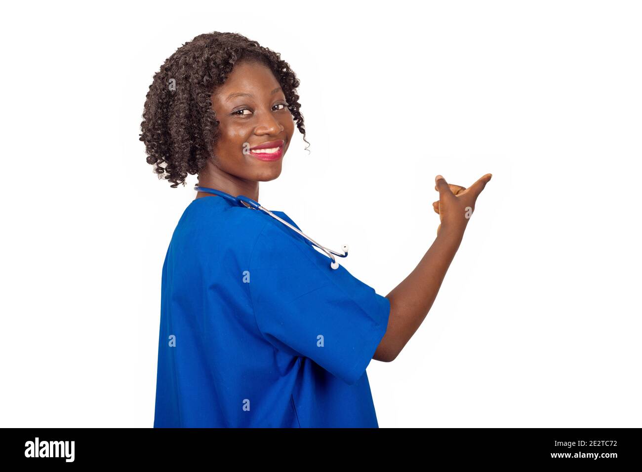 young nurse standing in stethoscope blouse at the neck pointing at a ...