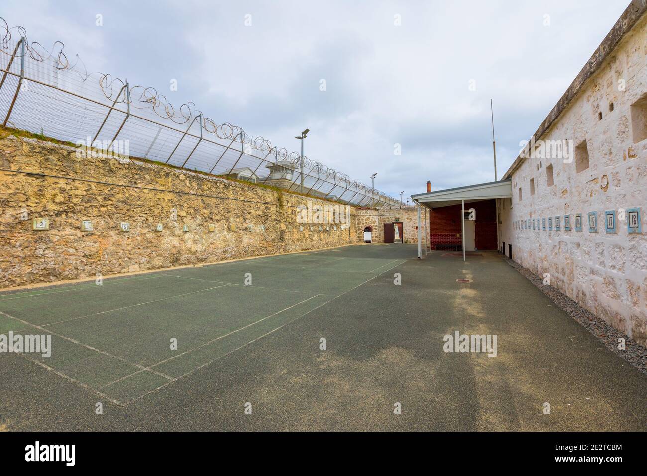 courtyard with barbed wire of Fremantle Prison historic building ...