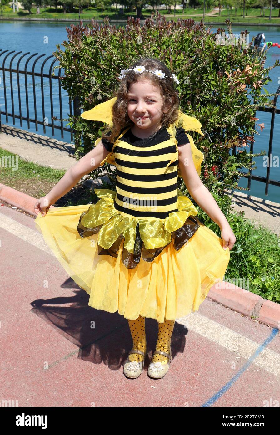 ADANA,TURKEY-APRIL 9:Unidentified Cute little girl with Bumble Bee ...