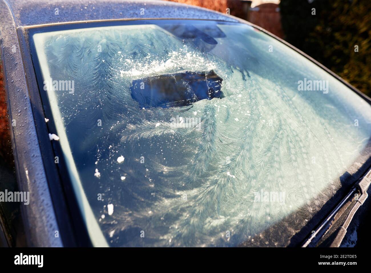 Scraped windscreen for driver to see out Stock Photo - Alamy