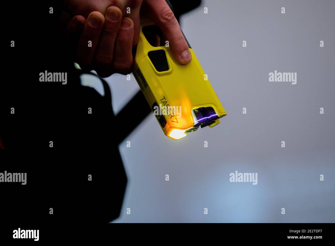 Dortmund, Germany. 15th Jan, 2021. A police officer demonstrates a ...