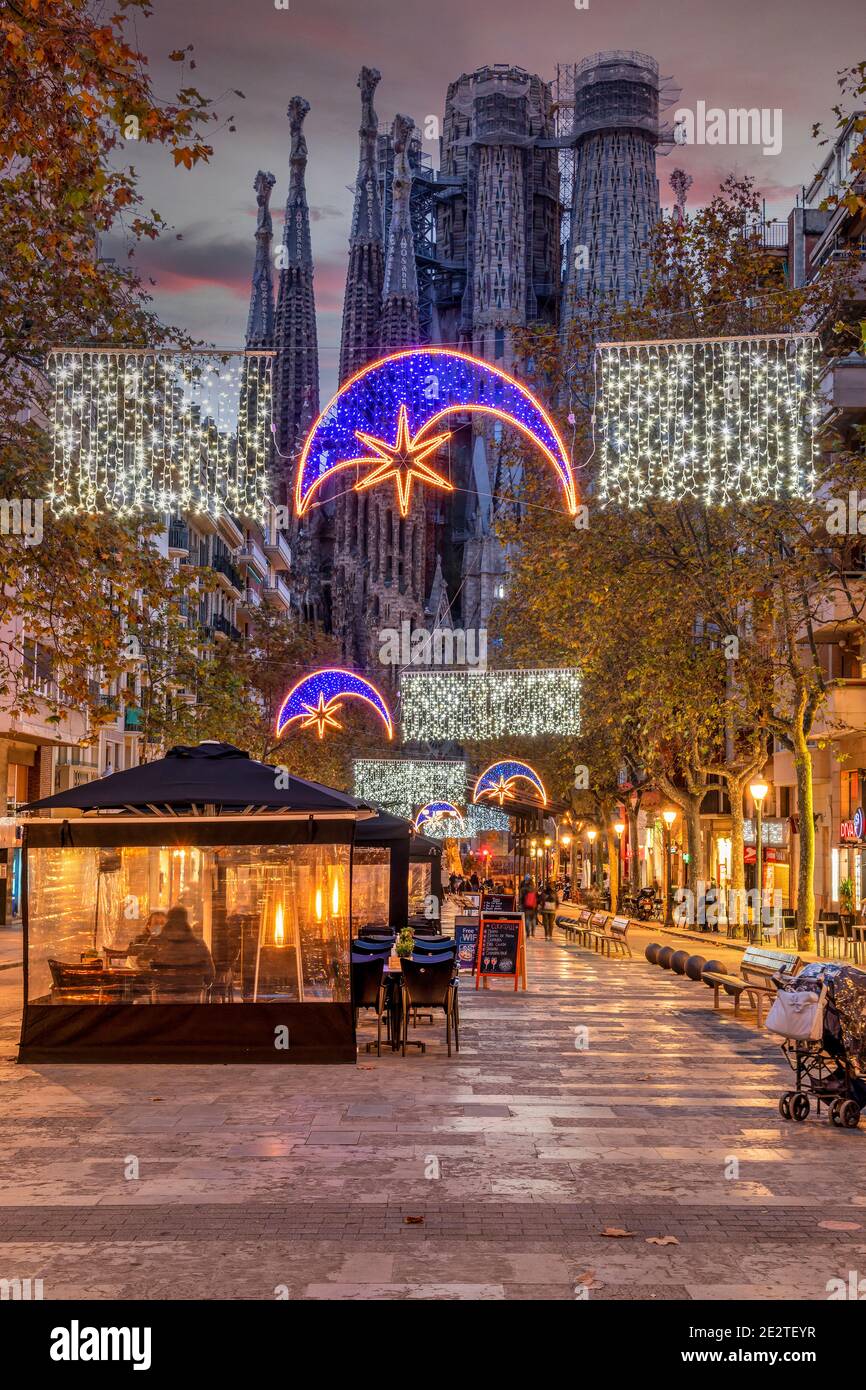 Avinguda Gaudi pedestrian mall adorned with Christmas lights with Gaudi ...
