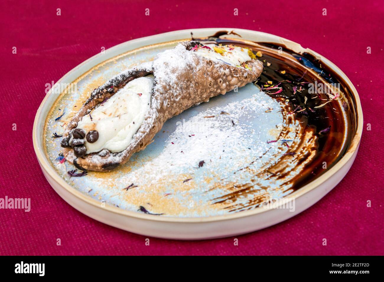 Typical Sicilian Cannoli pastry served in a restaurant of Catania ...