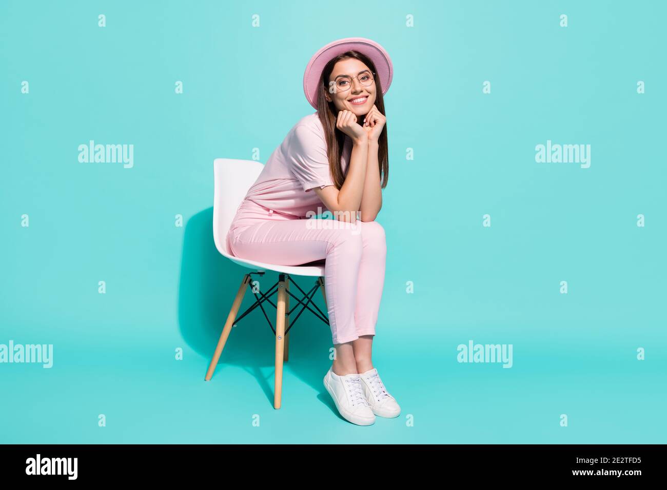 Full size photo of pretty nice lady sitting on white chair isolated ...