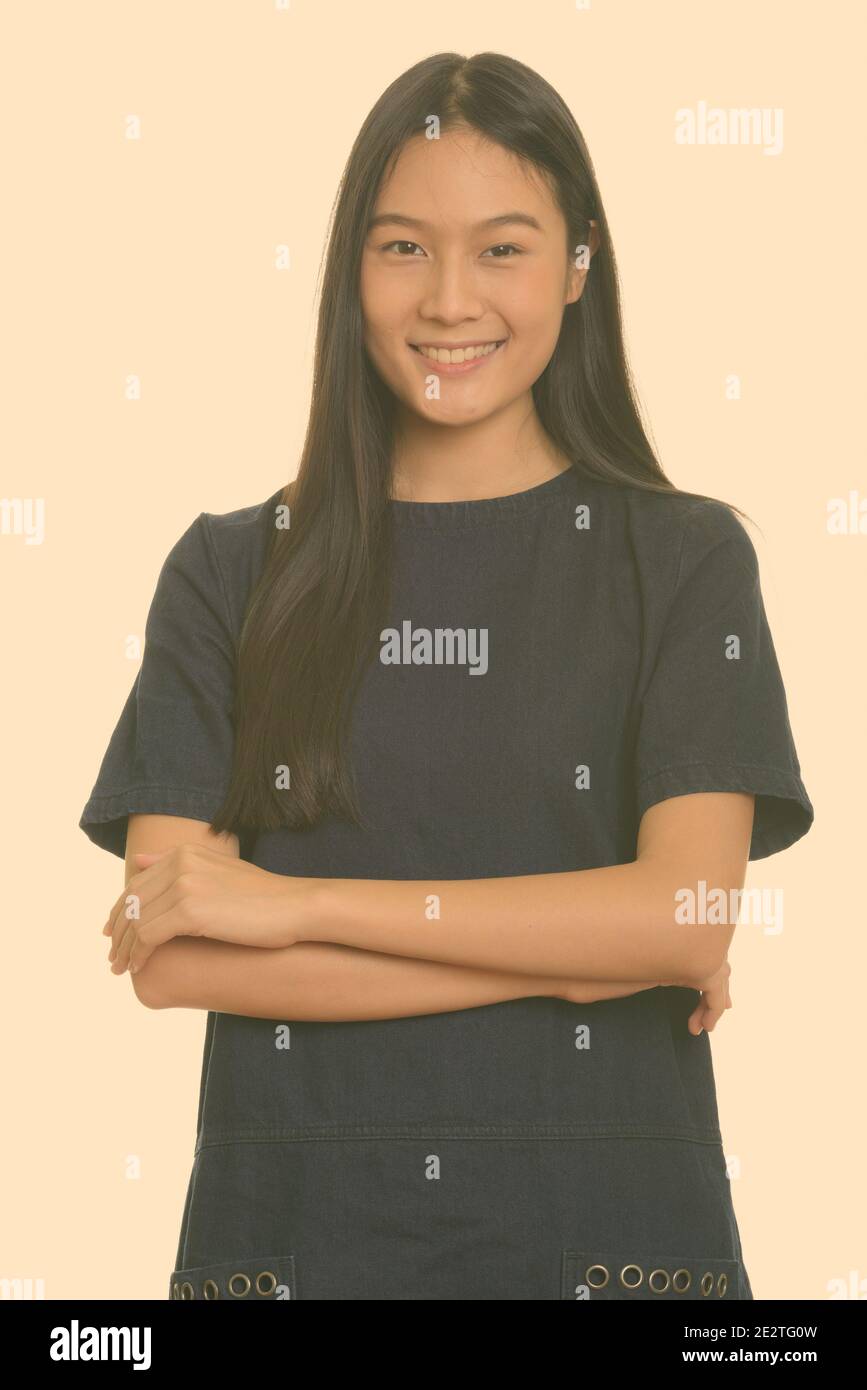 Young happy Asian teenage girl smiling Stock Photo - Alamy