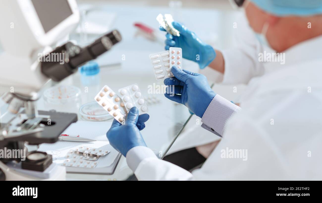 close up. scientists are testing samples of new drugs Stock Photo - Alamy