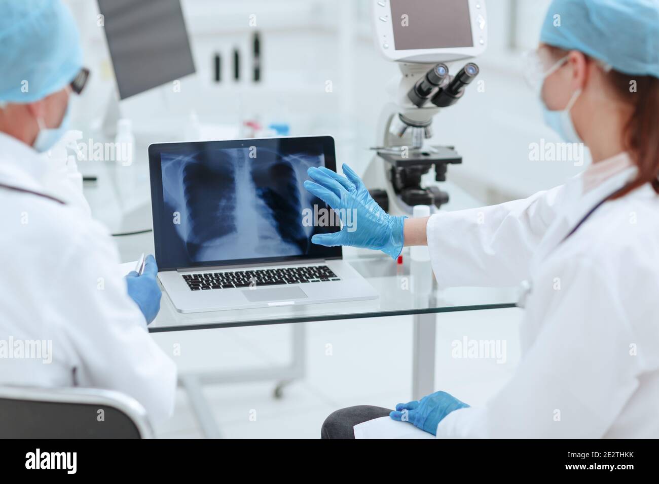 doctors looking at the Chest x-ray scan on screen of laptop Stock Photo ...