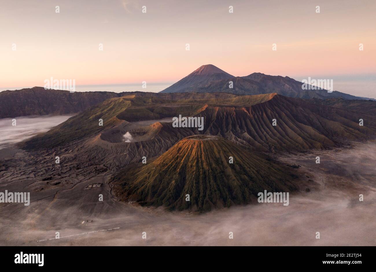 The volcanic peaks of Mount Bromo and Mount Semeru in pat of the ...
