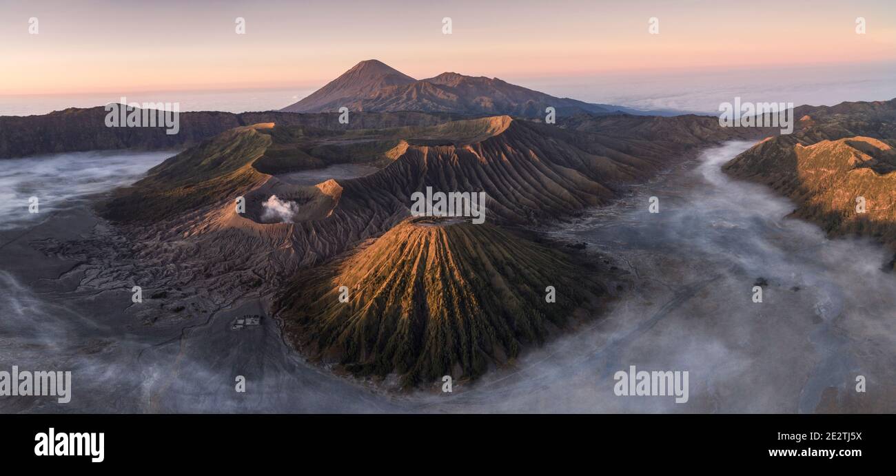 The volcanic peaks of Mount Bromo and Mount Semeru in pat of the ...