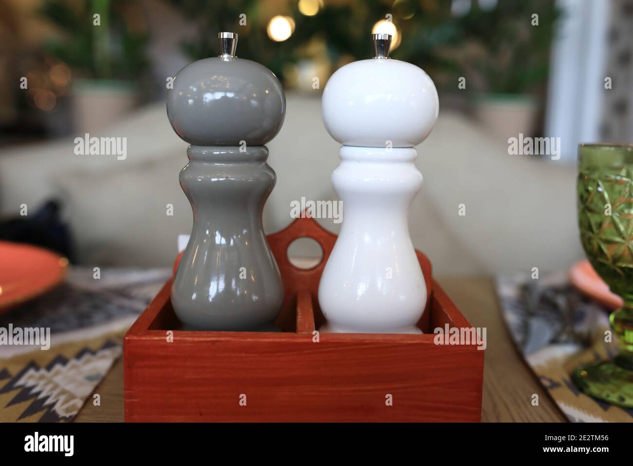 Pepper and salt shaker set in restaurant Stock Photo - Alamy