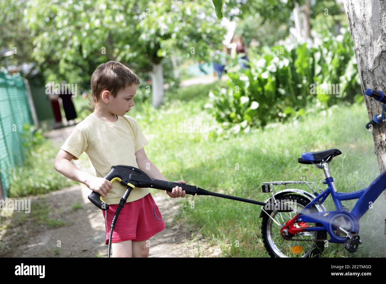 Water pump wash washing boy hi-res stock photography and images - Alamy