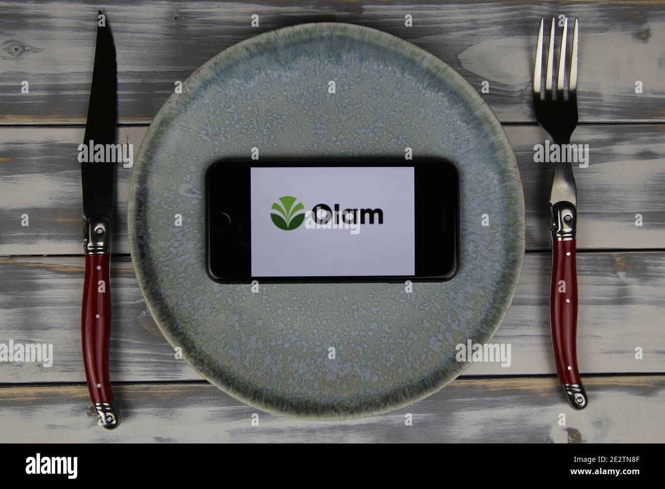 Viersen, Germany - May 9. 2020: Closeup of mobile phone on plate and ...