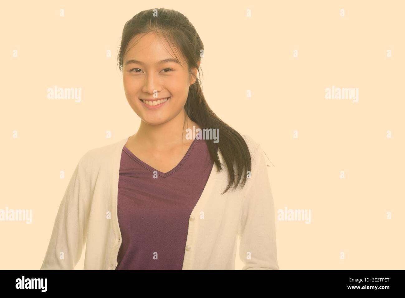 Young happy Asian teenage girl smiling Stock Photo - Alamy