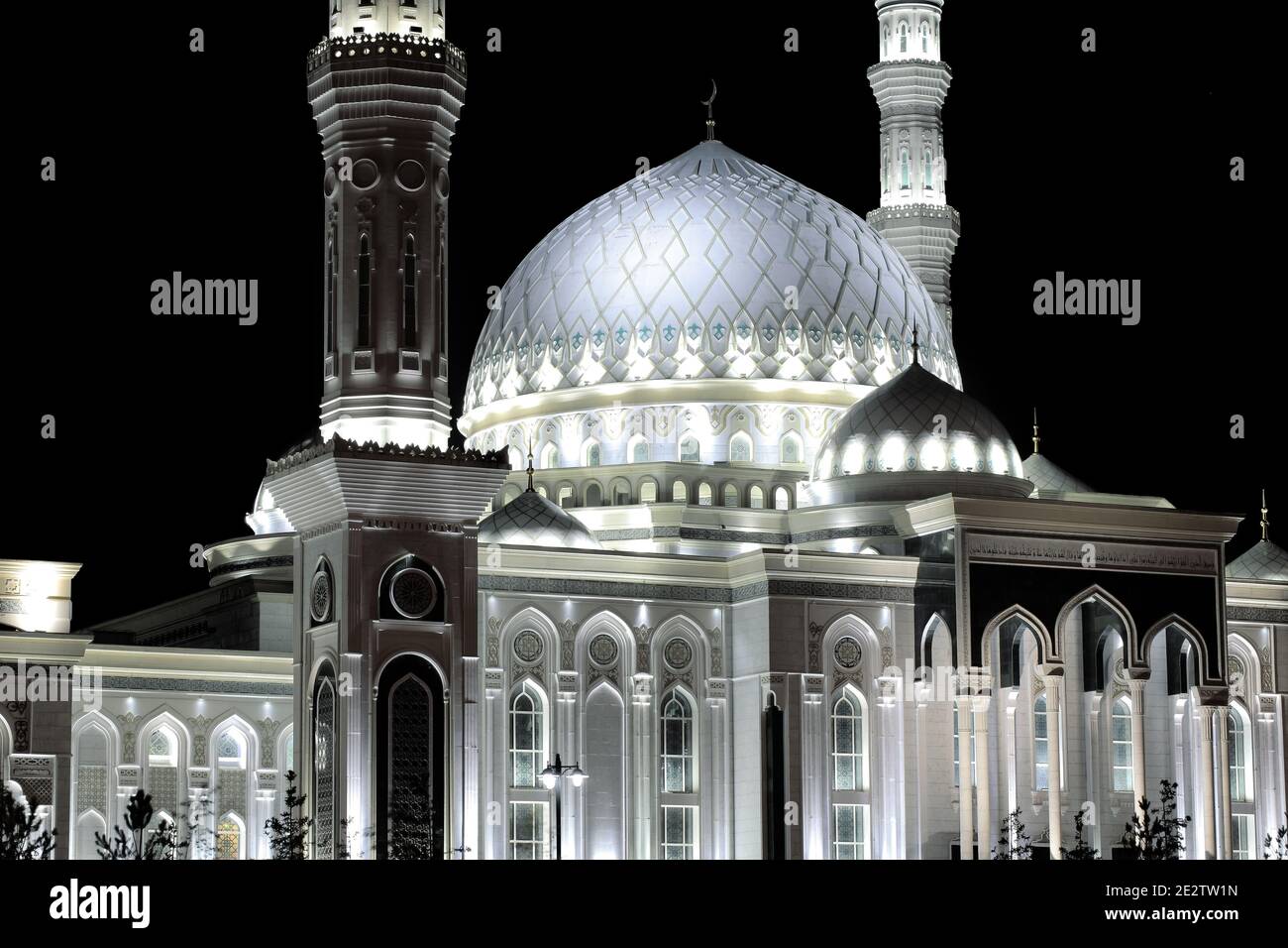 Night urban scene with illuminated mosque Stock Photo - Alamy