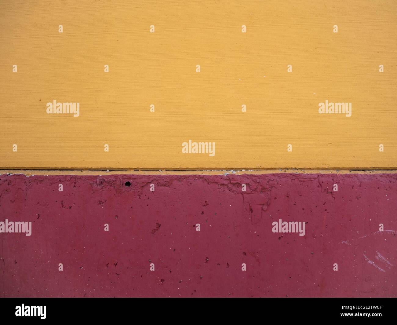 Weathered red and yellow wall Stock Photo - Alamy