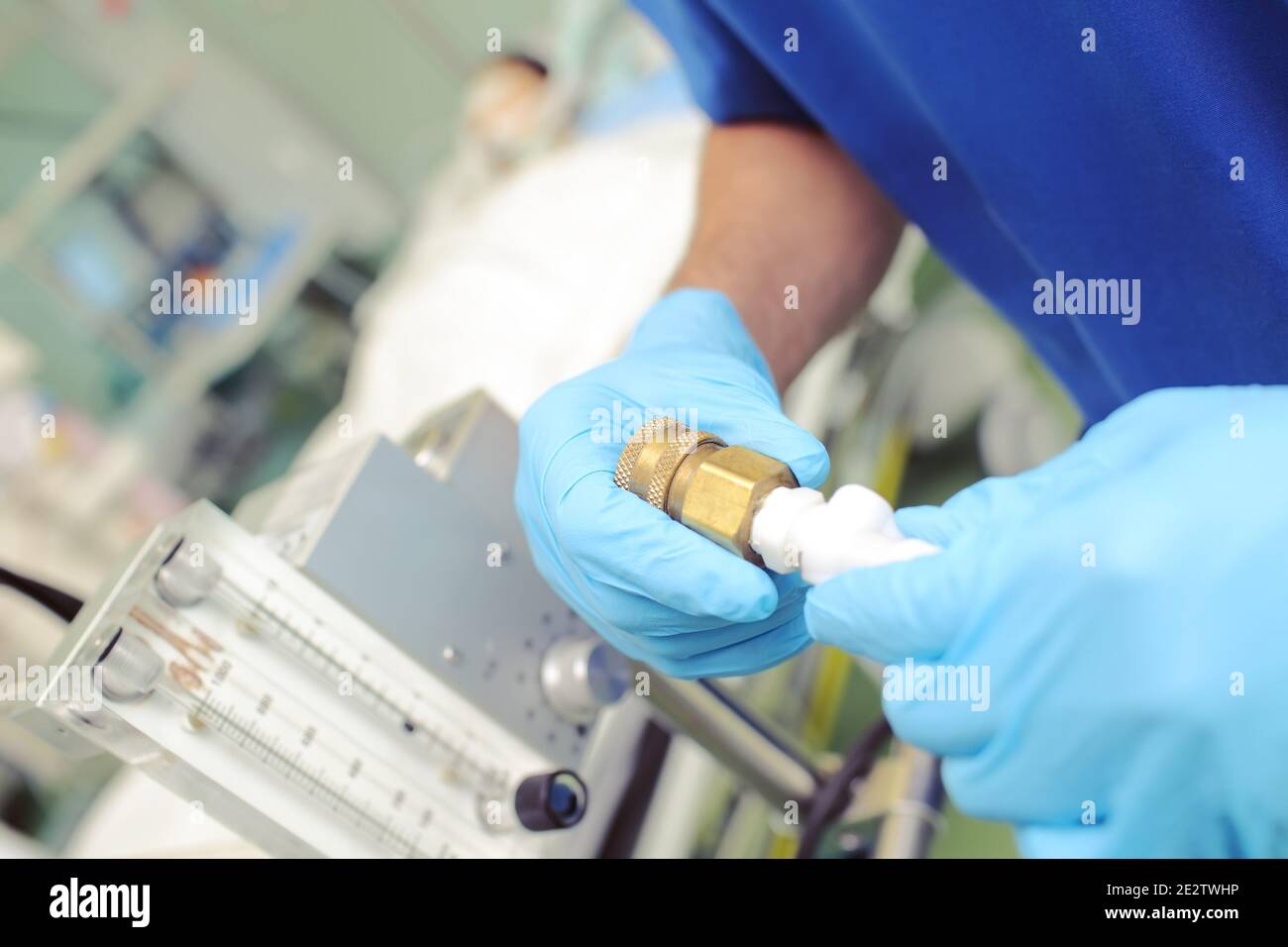 Medical worker in the hospital controls gas passing Stock Photo - Alamy