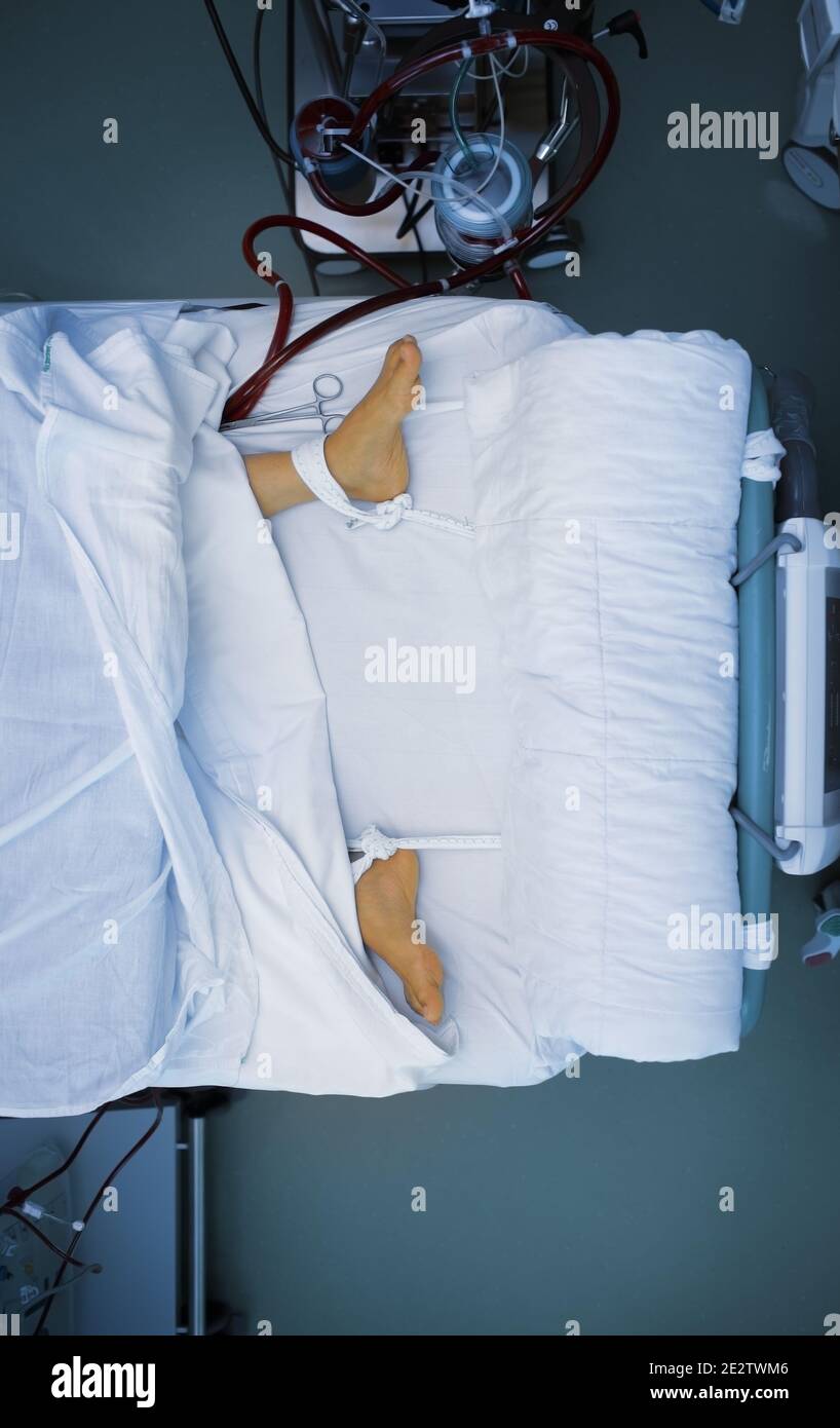 Feet at the end of the bed + hospital hi-res stock photography and ...