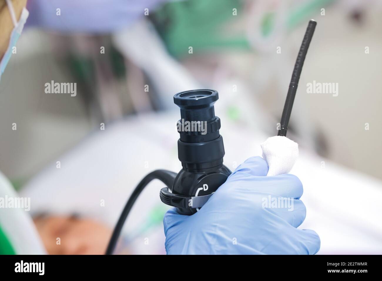 Endoscope in the hands of an endoscopist. Readiness to work Stock Photo ...