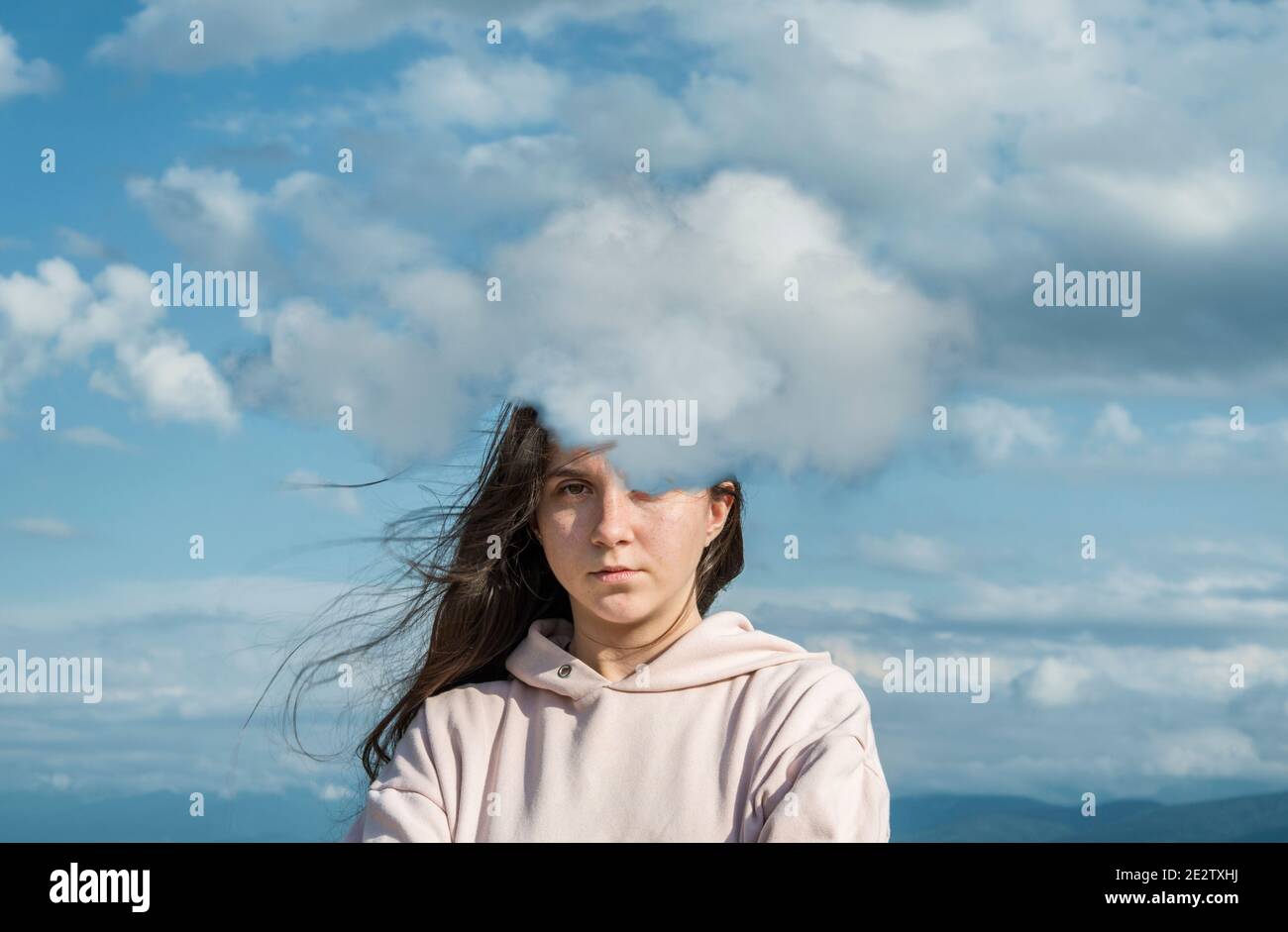 A young girl behind a cloud Stock Photo - Alamy