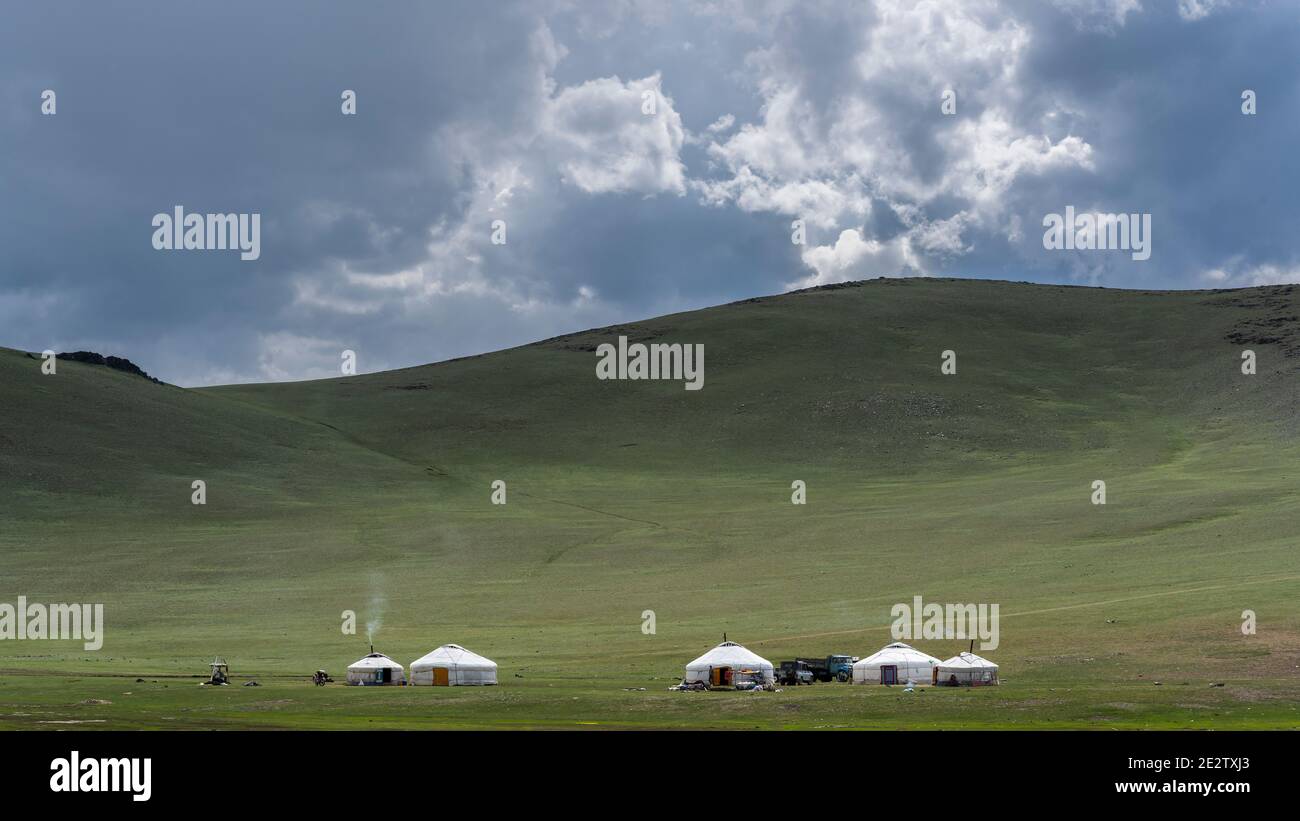 Bayan Olgi, Mongolia, August 5, 2019: Five yurts with cars in the ...