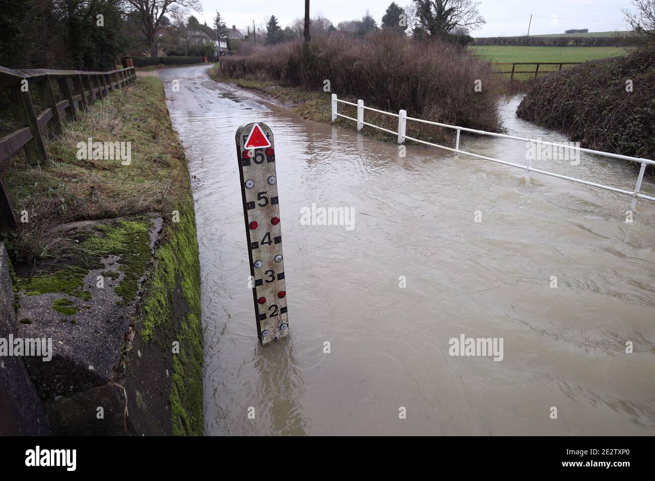 A flooded road in the village of Great Easton, Dunmow, where the River ...