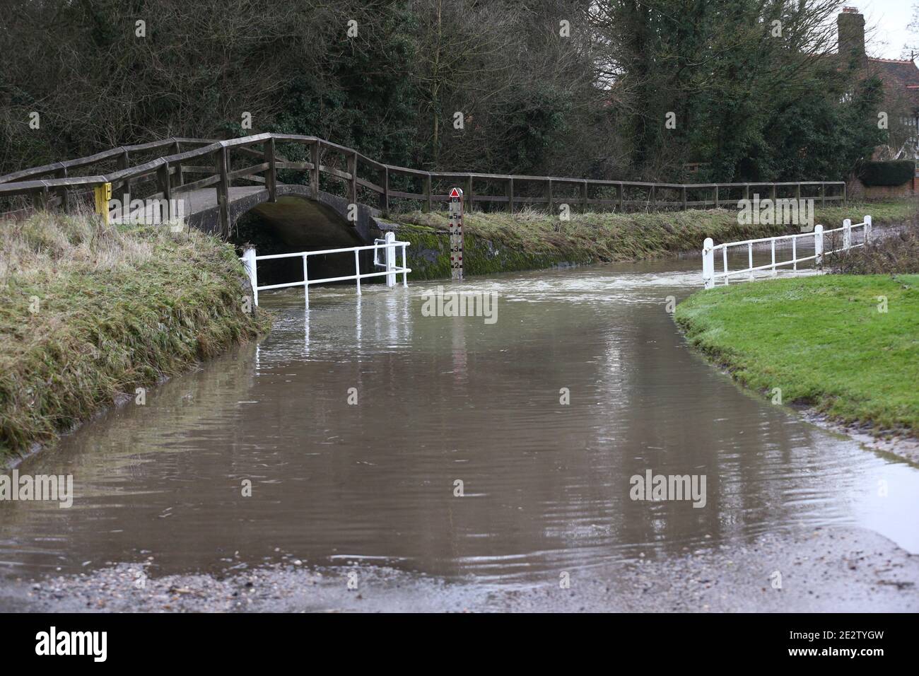 A flooded road in the village of Great Easton, Dunmow, where the River ...
