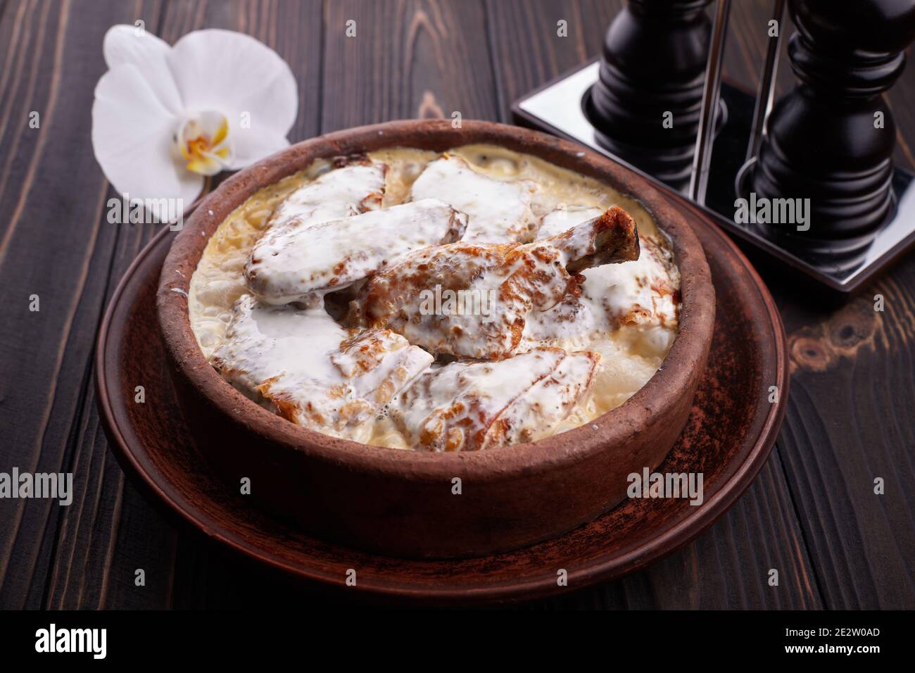 Chicken chkmeruli in georgian creamy hi-res stock photography and ...