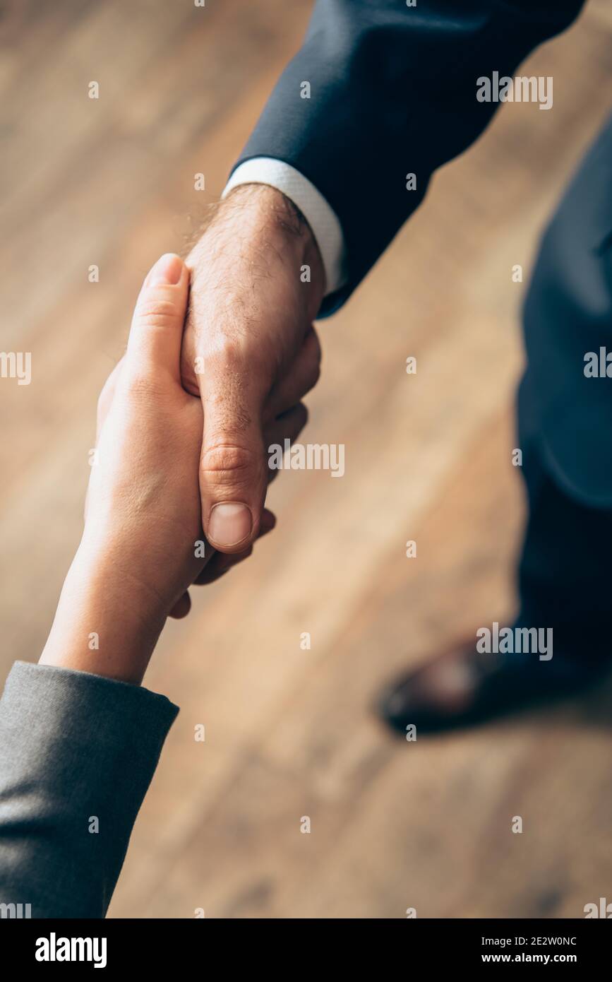 Business people handshaking office hi-res stock photography and images ...