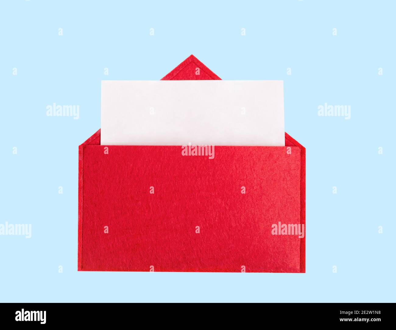 Red open envelope with a sheet of paper with mock-up on a blue ...