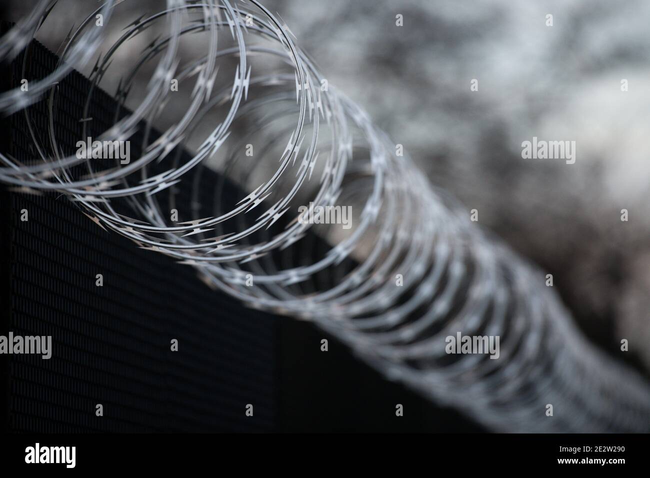 Concertina wire on fencing hi-res stock photography and images - Alamy