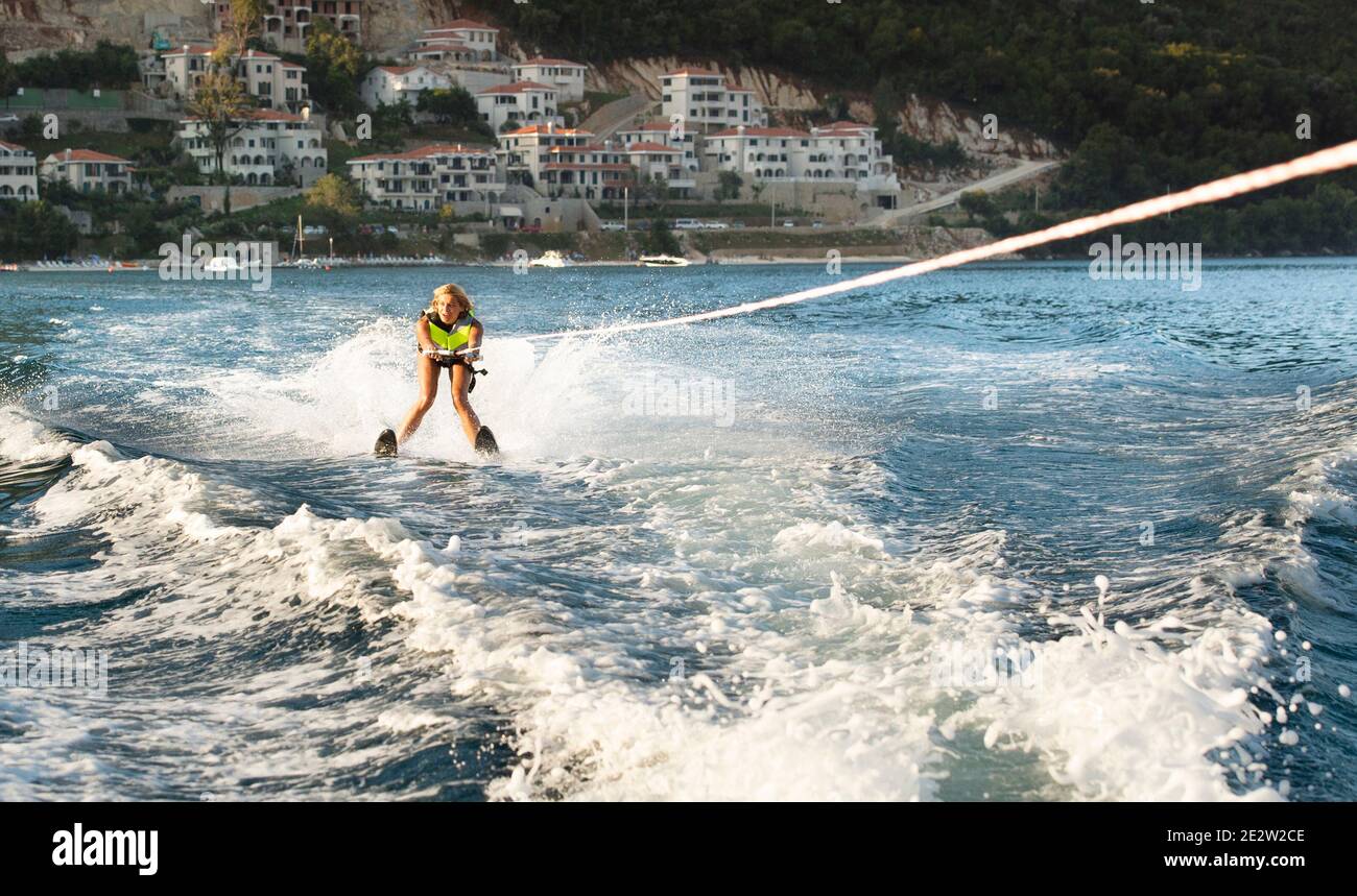 young woman water skiing on a sea Stock Photo - Alamy