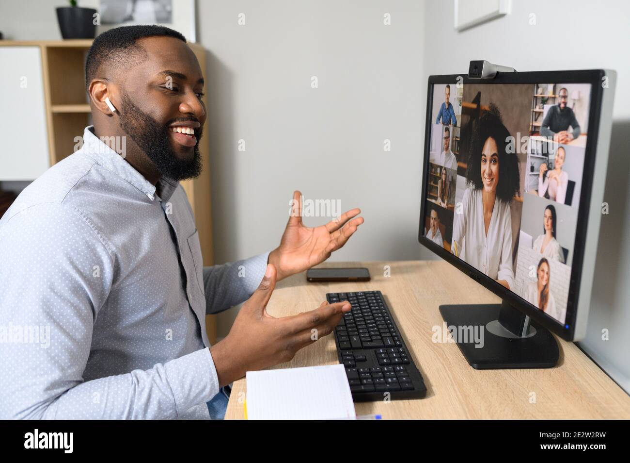 An African guy is talking via video call Stock Photo - Alamy