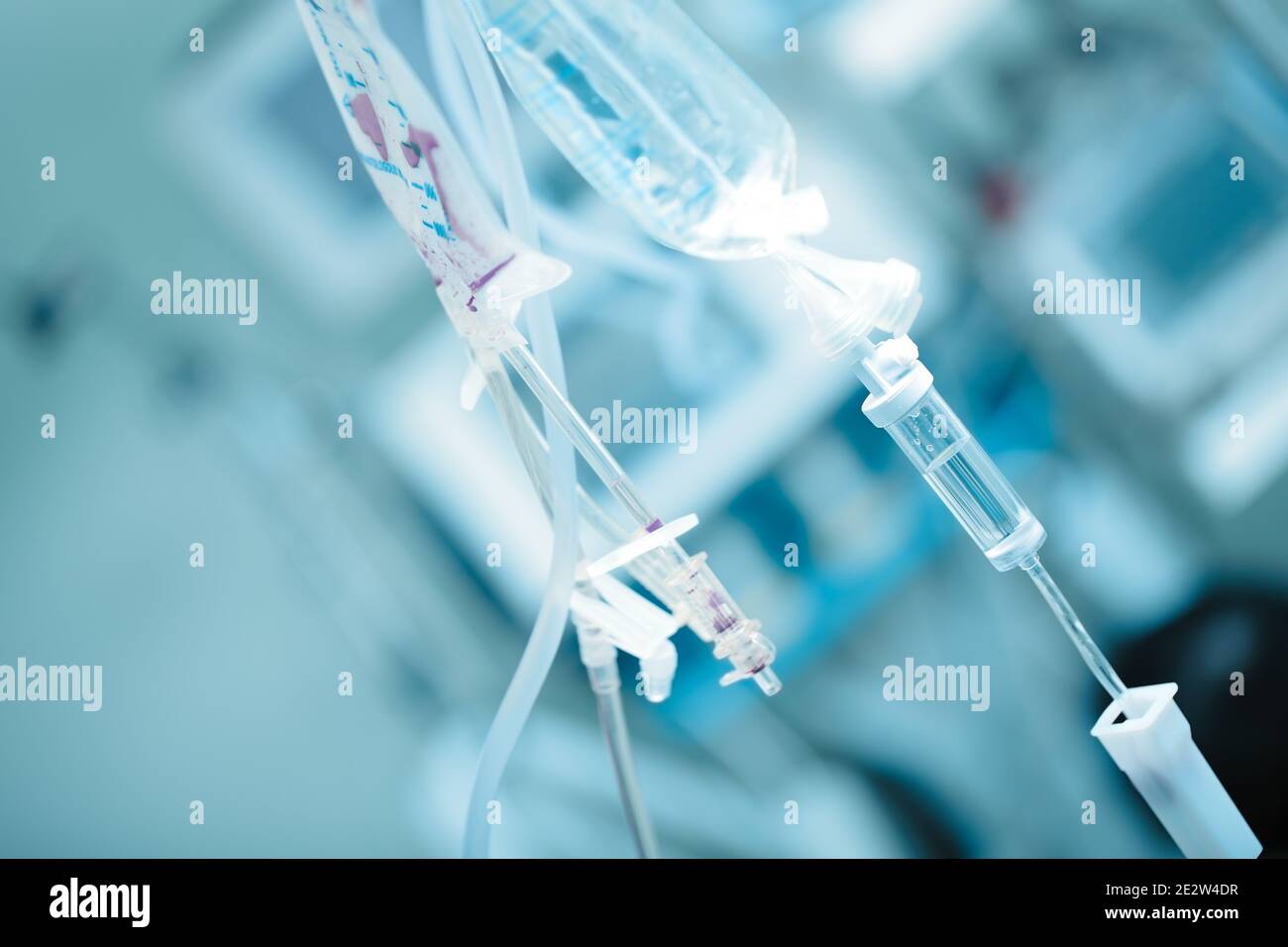 Medical solution bags on the background of ward Stock Photo - Alamy