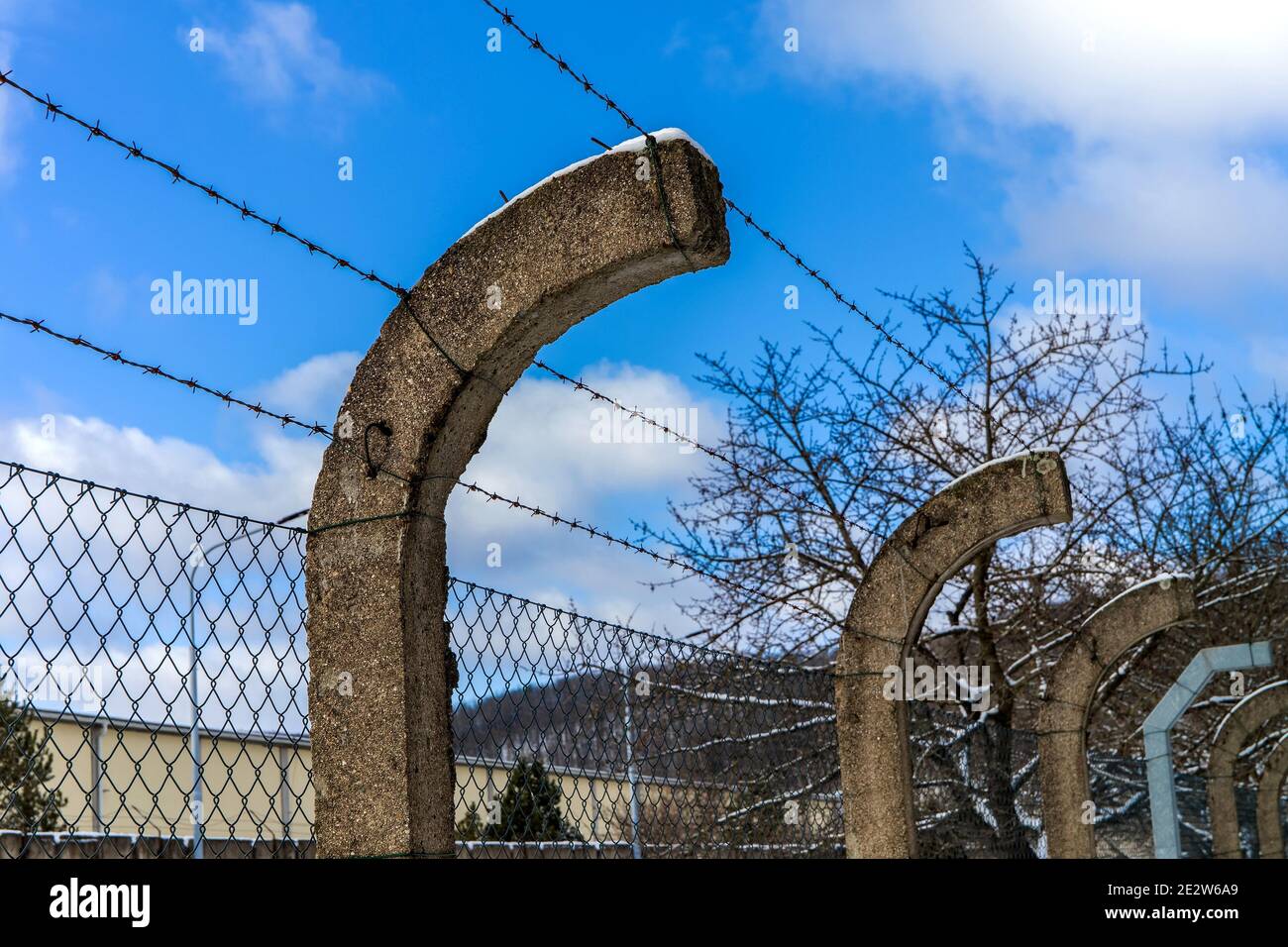 Restricted area - fence with barbed wire. Razor wire jail fence ...