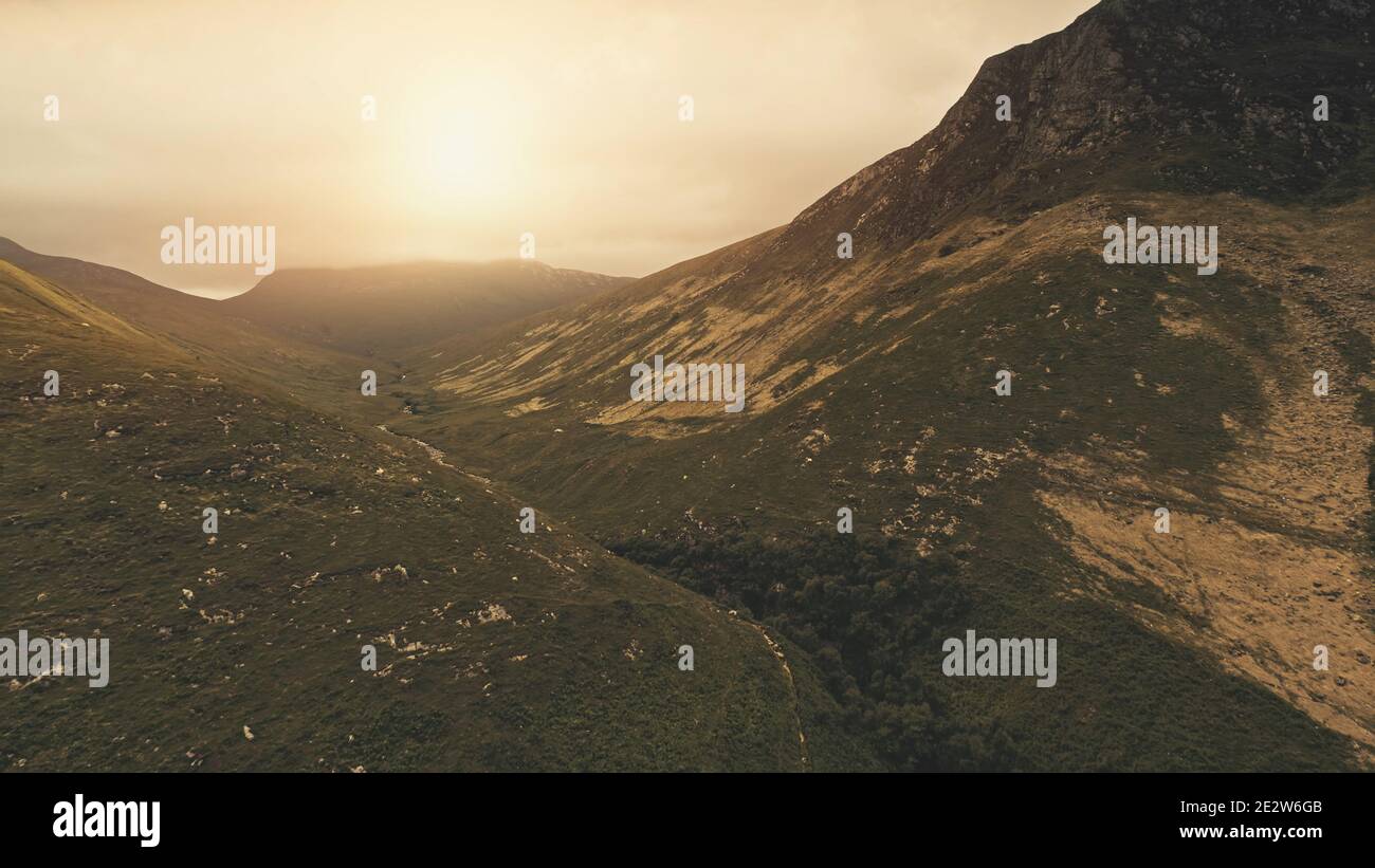 Sun over mountain aerial. Nobody nature landscape. Wild untouched scape ...