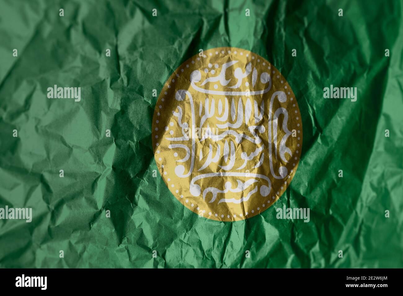 Rohingya flag painted on crumpled paper background Stock Photo - Alamy