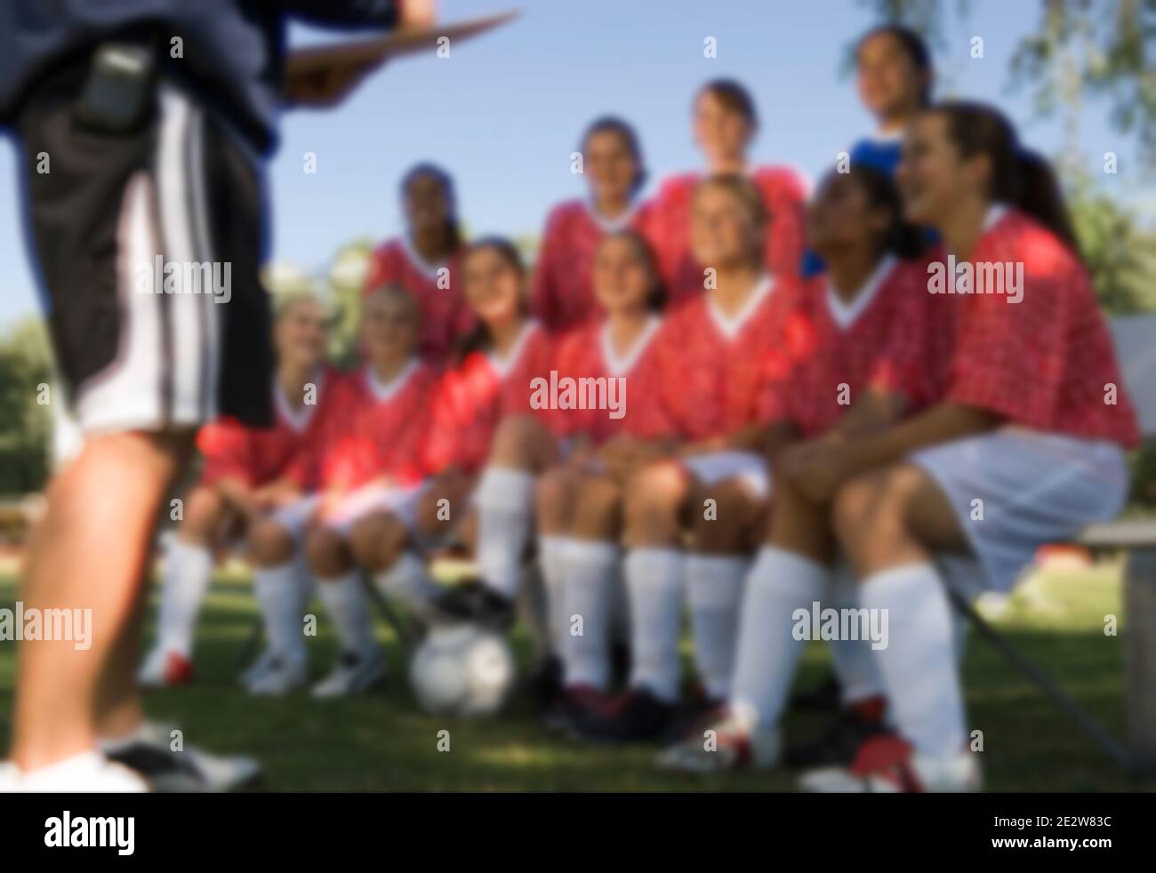Coach talking to young soccer players hi-res stock photography and ...