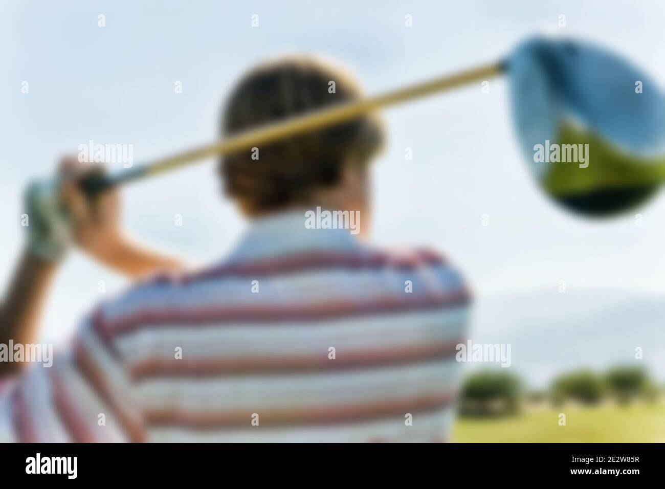 Professional golfer watching ball hi-res stock photography and images ...