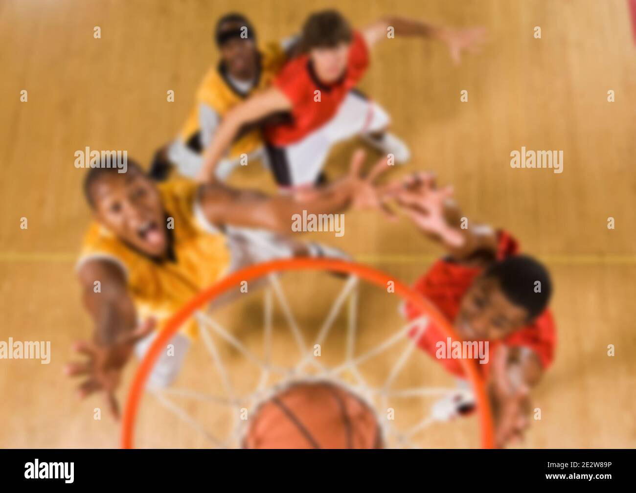 High angle view of basketball player dunking basketball in hoop Stock ...