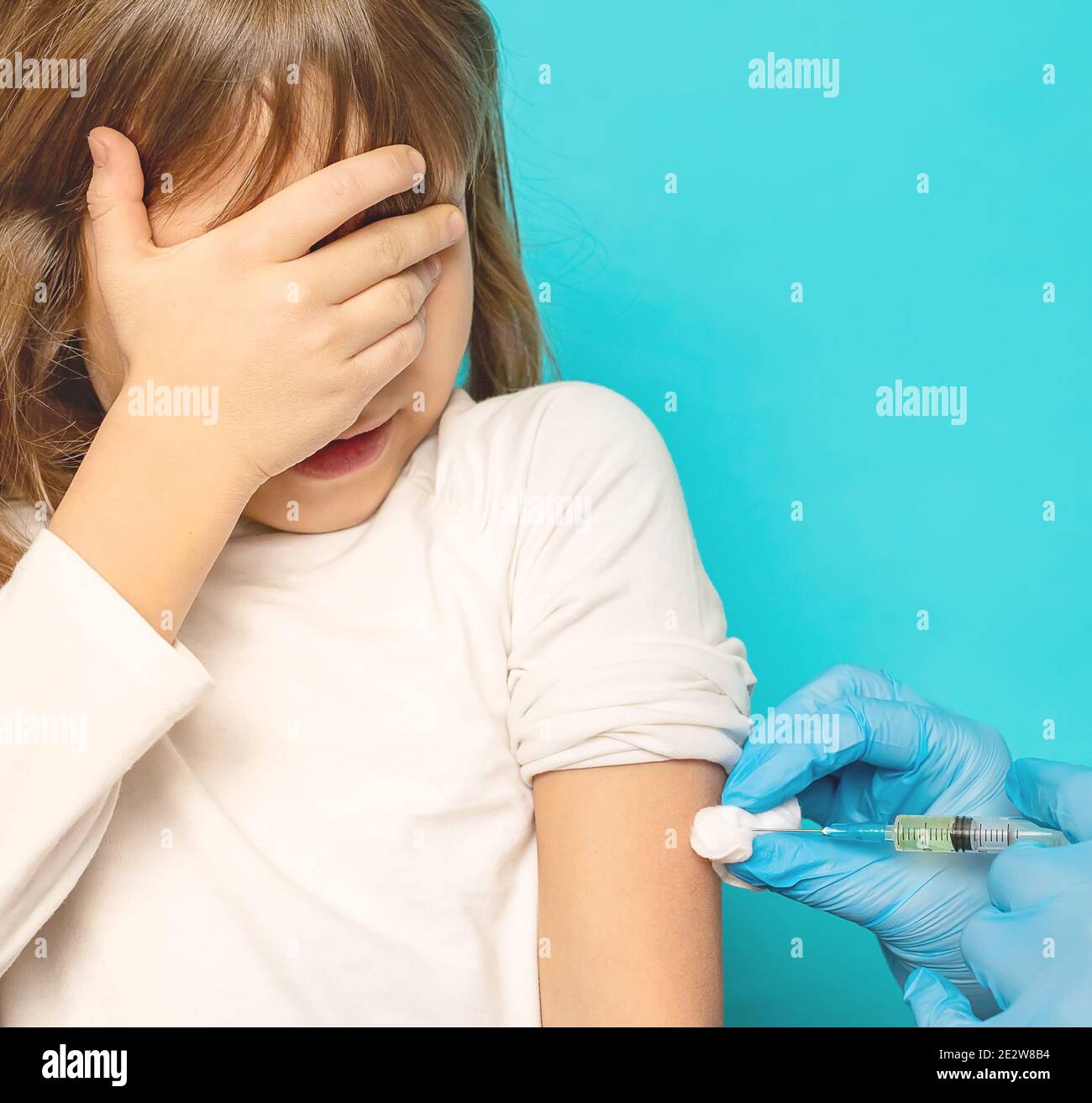 The child is injected into the arm. Selective focus Stock Photo - Alamy