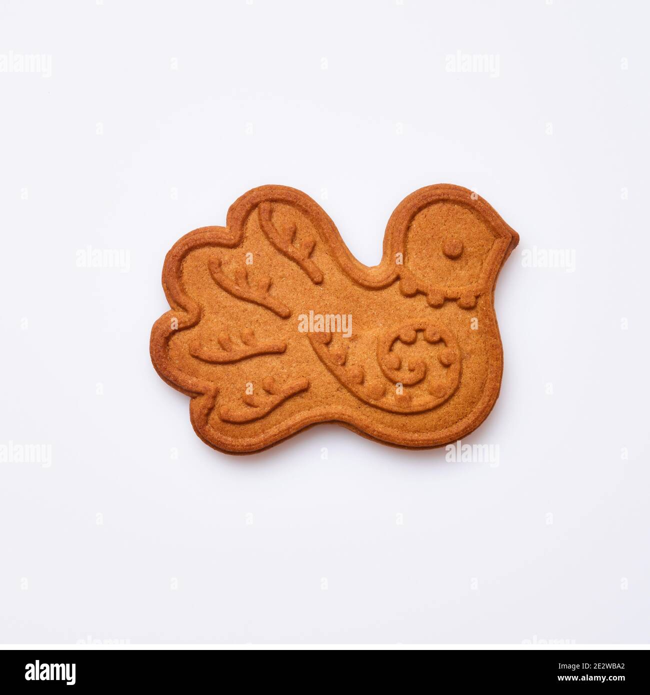 New Year gingerbread or bird dove shaped cookies isolated on white ...