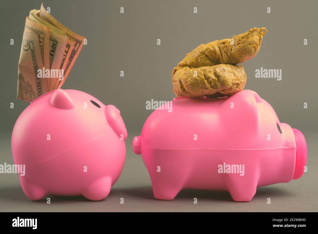 Two Piggy Banks In A Row Stock Photo - Alamy