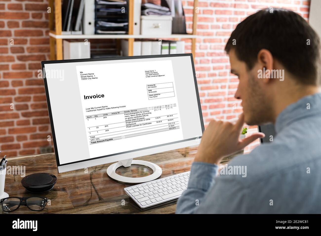 Checking computer hi-res stock photography and images - Alamy