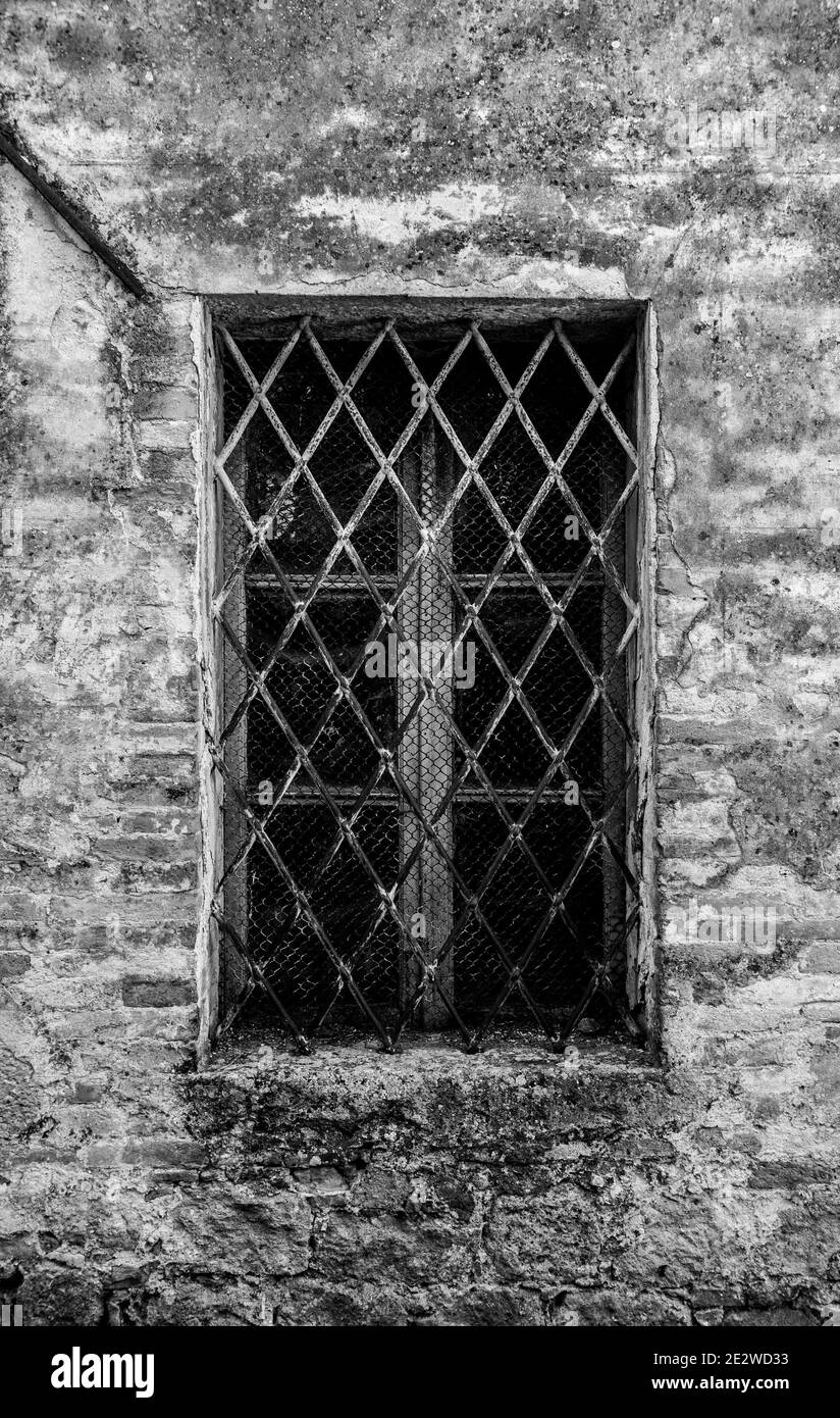 Picturesque barred window Black and White Stock Photos & Images - Alamy