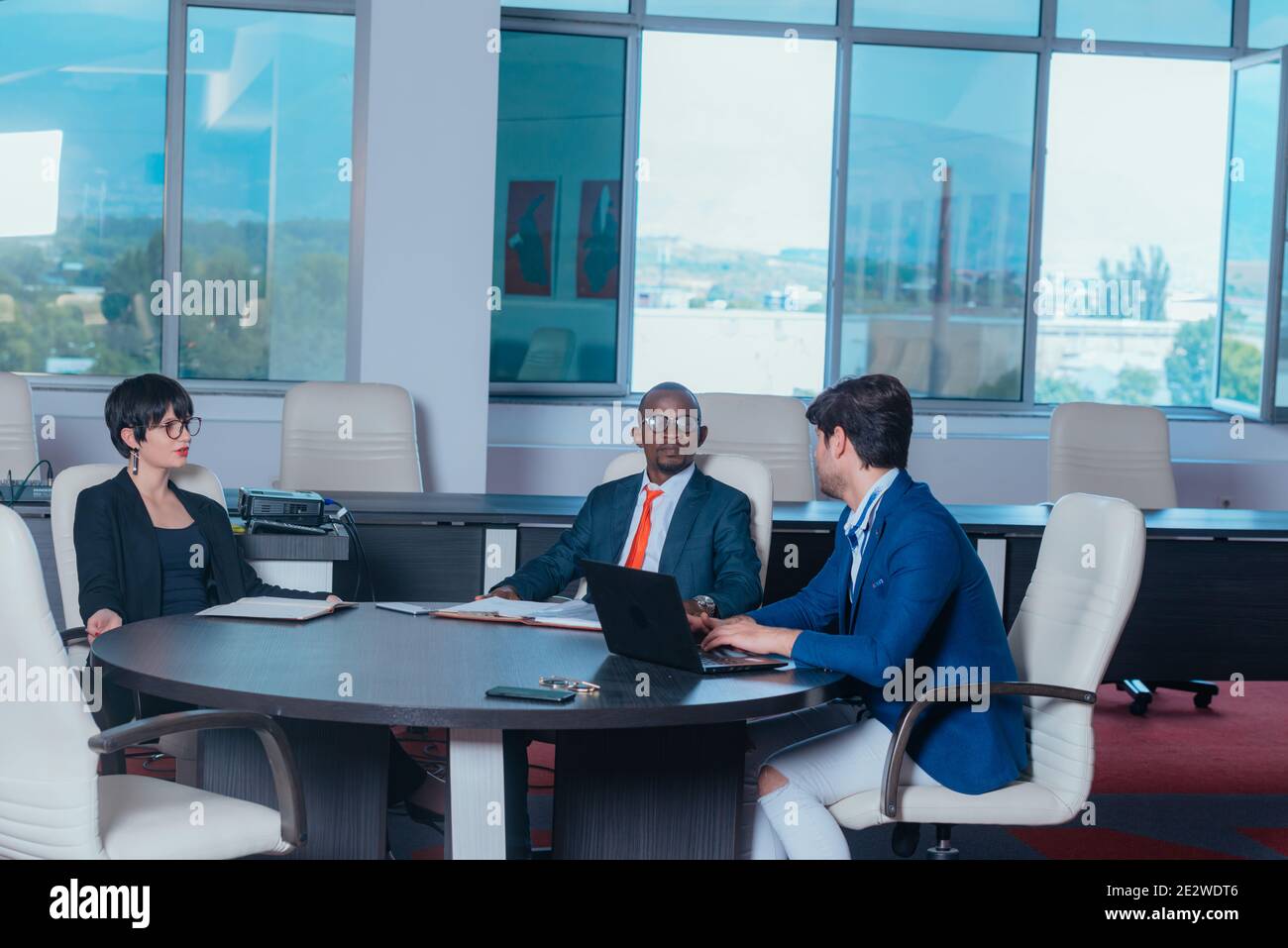 Corporate business team and manager in a meeting. Team building meeting ...