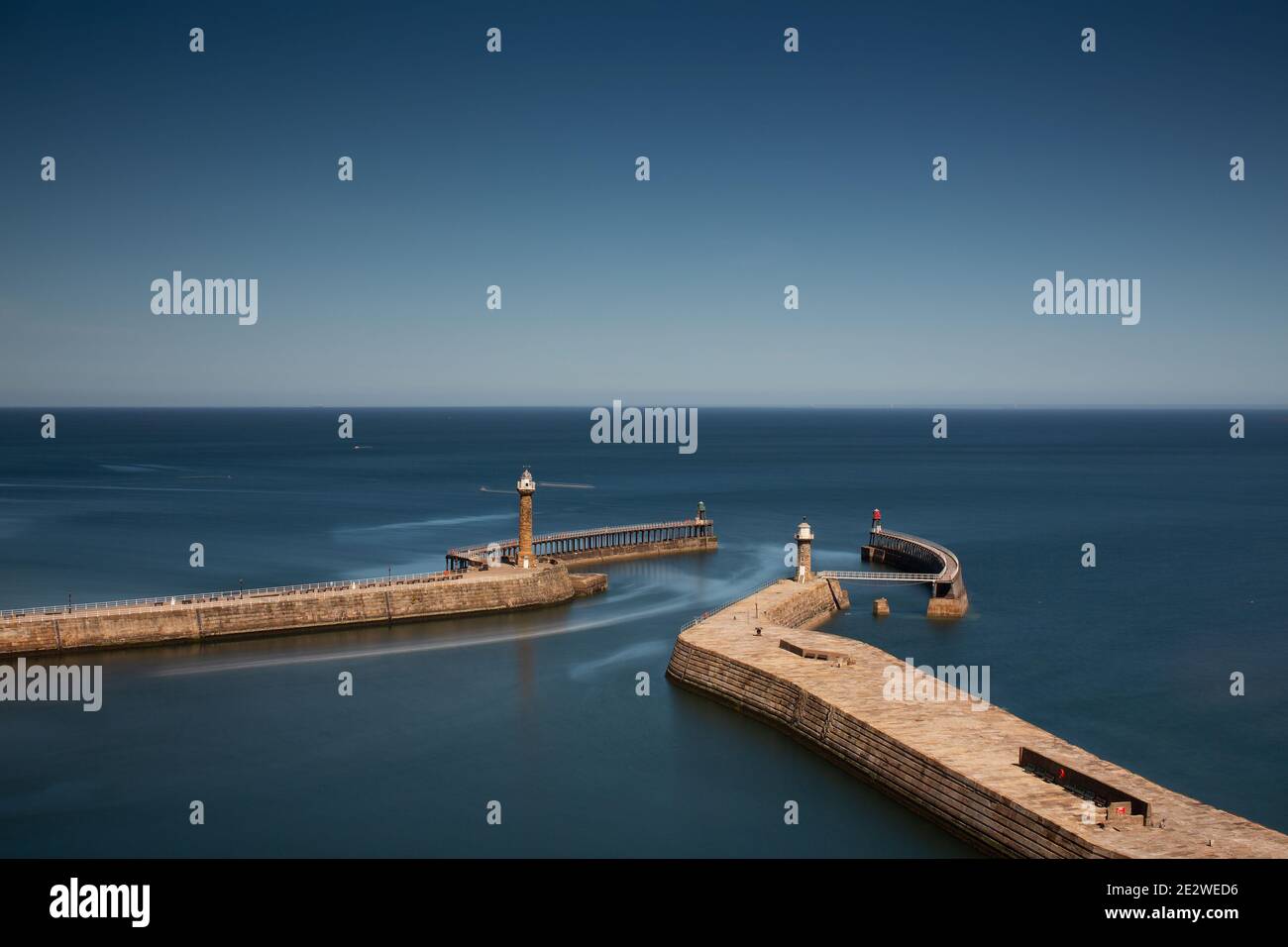 Whitby, piers and lighthouses, long exposure Stock Photo - Alamy