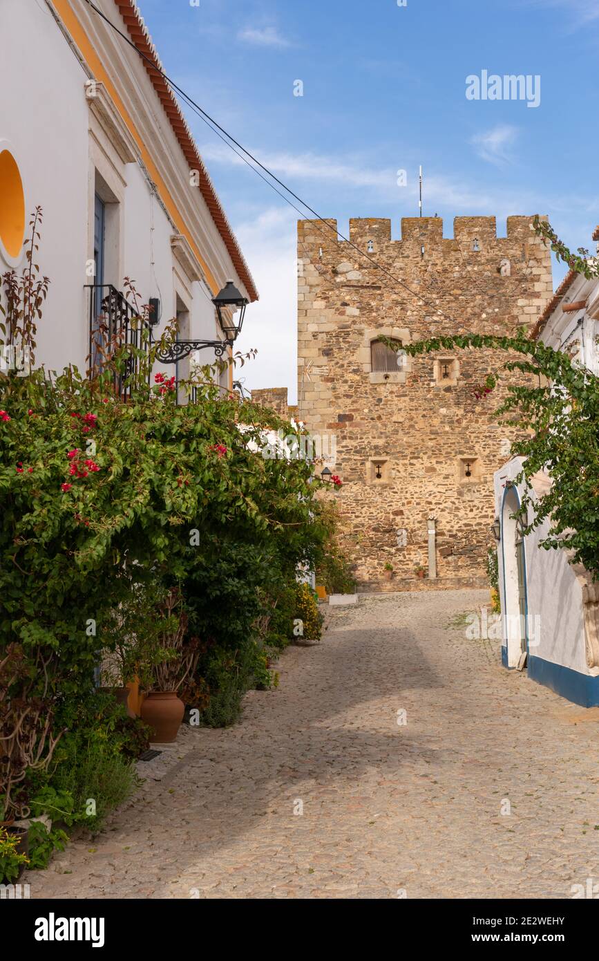 Traditional houses and castle on the Alentejo village of Terena, in ...