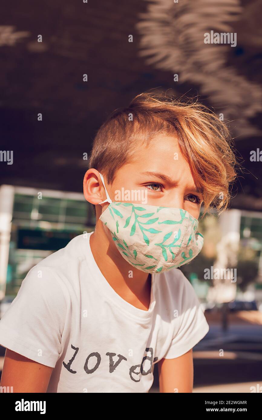 Young boy wearing a mask Stock Photo - Alamy